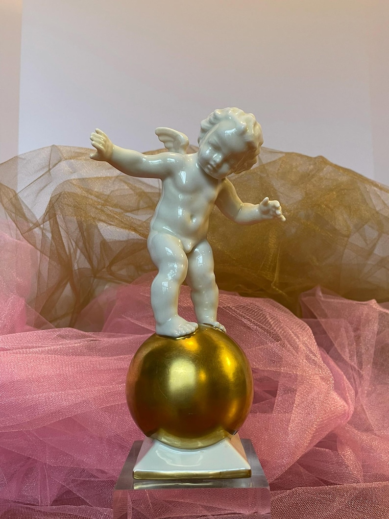 Cherub/putto on Gold Gilded Ball Designed by Karl Tutter Made by the ...