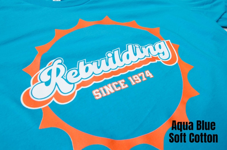 Funny Miami Football Fan Rebuilding Since 1974 Screen Printed Funny ...