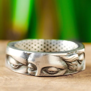 roman statue face ring