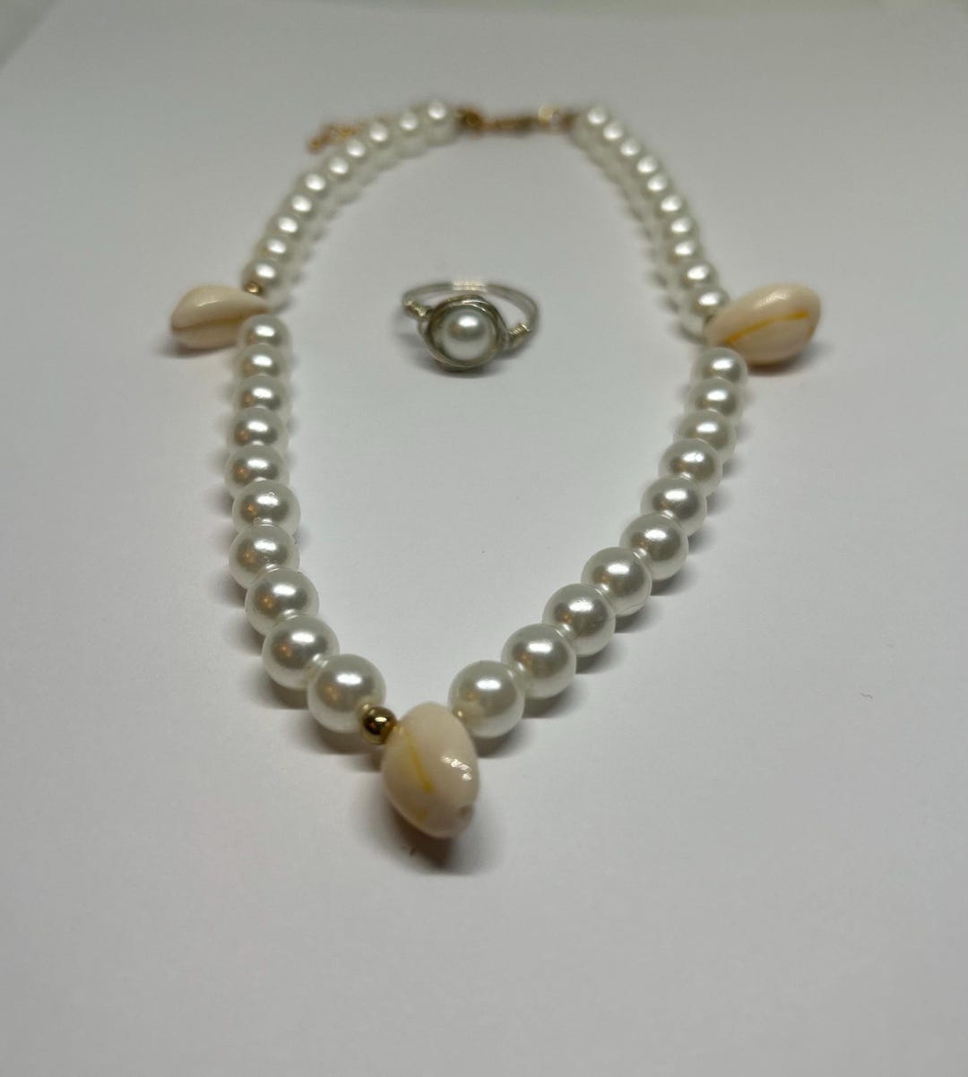 Pretty Girls Wear Wears Jewellery Stack - Ring and Necklace Shell and ...