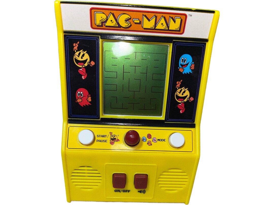 Retro Handheld PAC-MAN Game in Working Condition. Made by Bandai. Has 2 ...