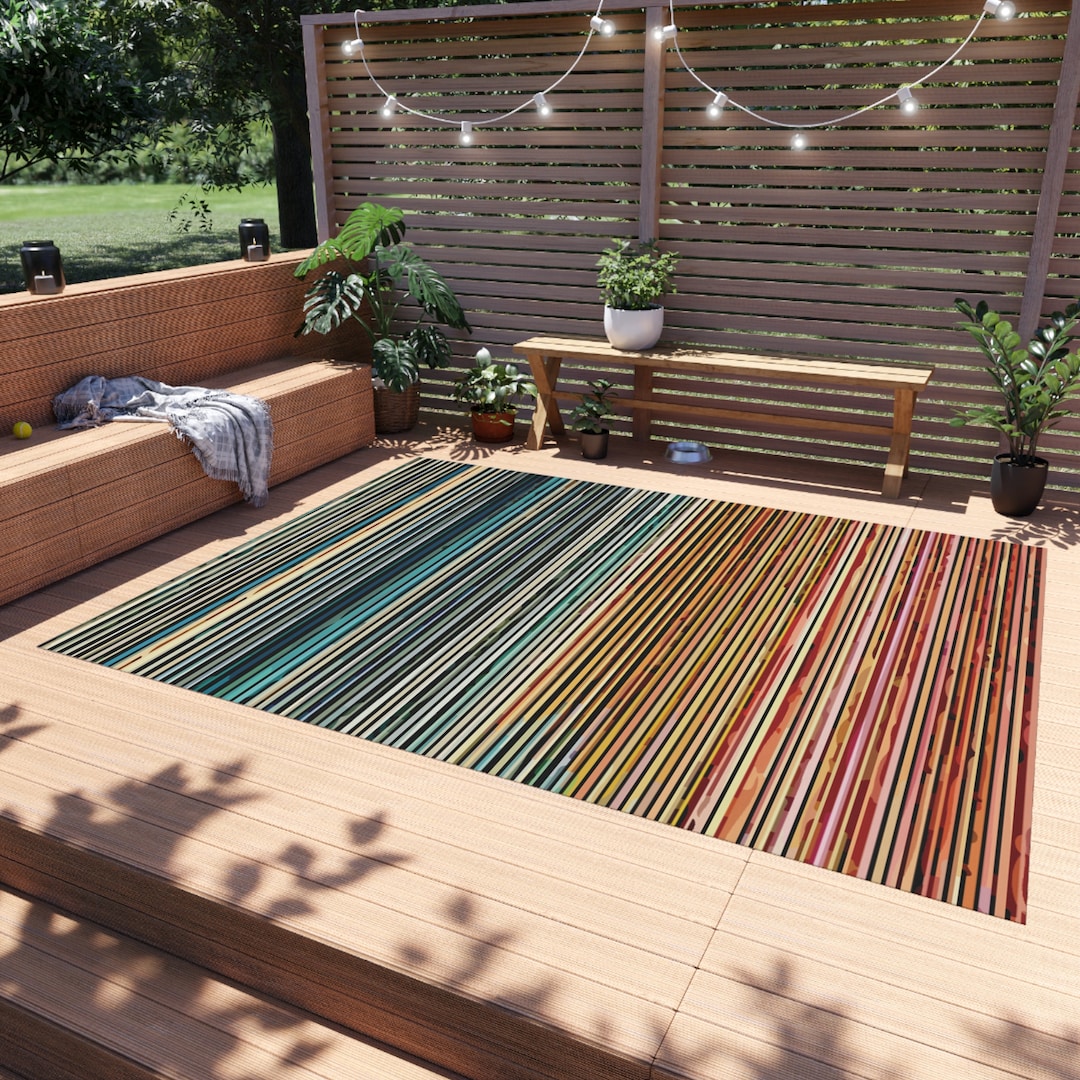 Blue and Rust Striped Outdoor Rug. This Rug Features Stripes ...