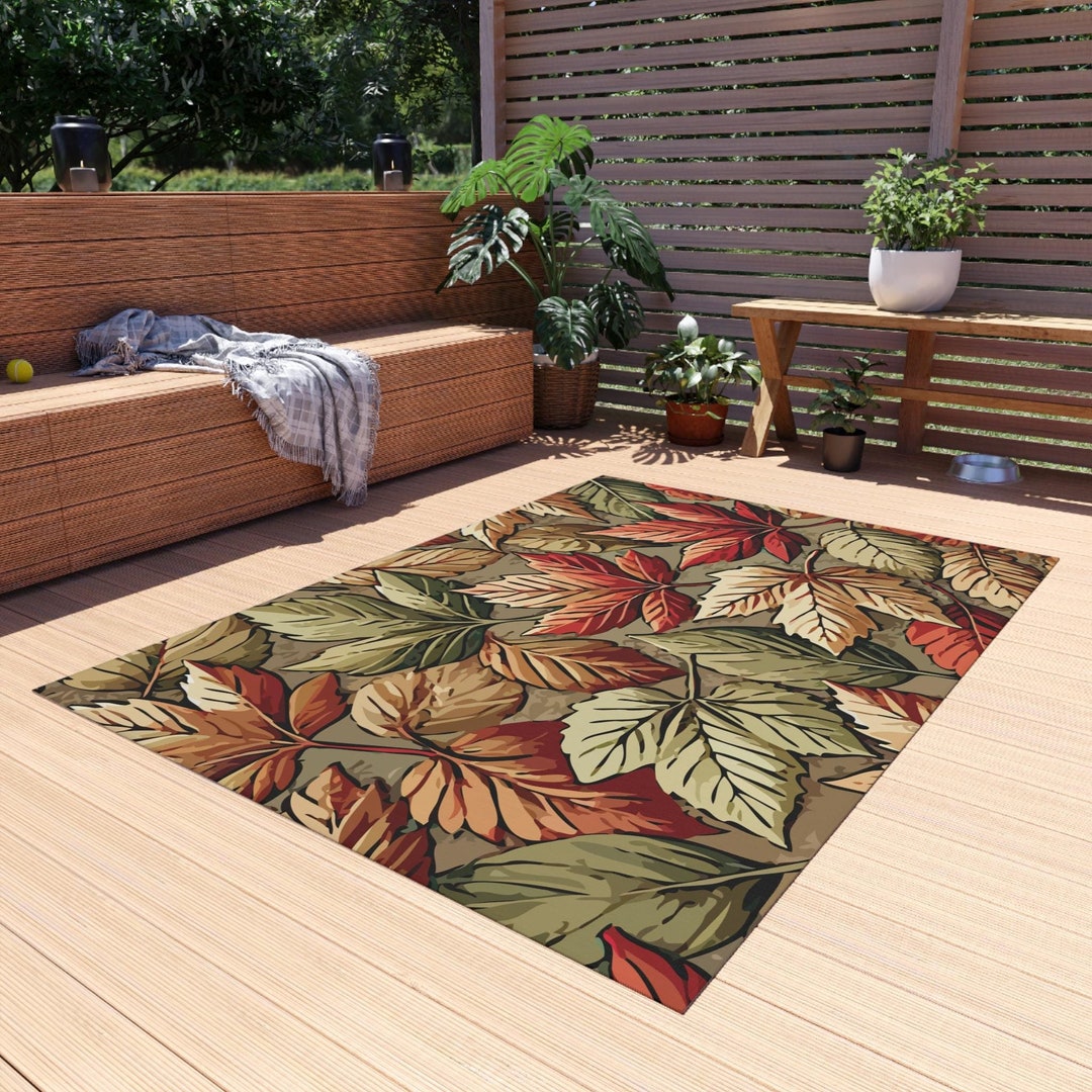Autumn Leaves Outdoor Rug. Featuring a Tapestry of Autumn Leaves in ...