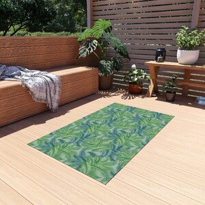 Green and Teal Palm Leaves Outdoor Rug. Featuring Palm Leaves in Shades ...
