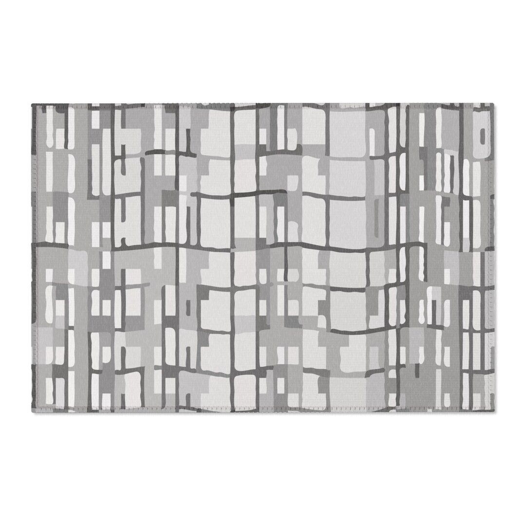 Gray and White Grid-patterned Area Rug. Featuring a Grid of Irregular ...
