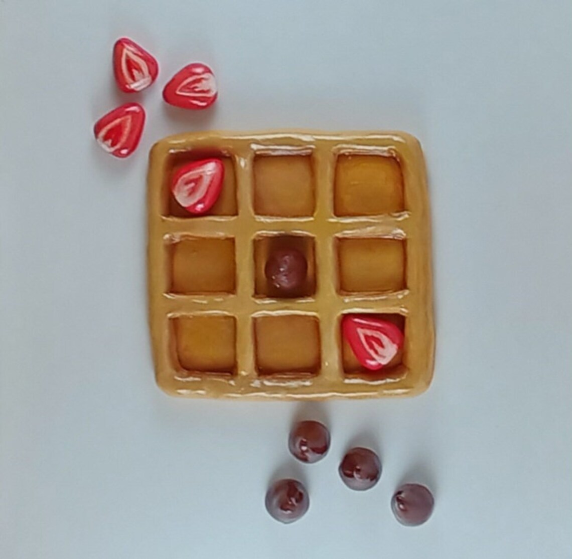 Strawberries and Milk Chocolate Chips on Waffle Tic Tac Toe Gameboard ...