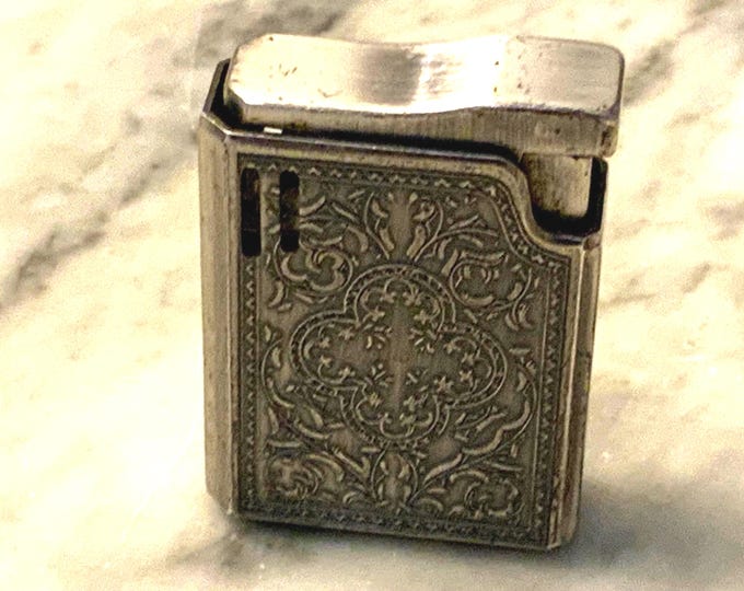 Vintage Colibri Butane Electric Lighter Known for Its Ornate Design and ...