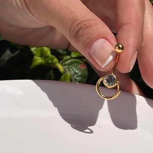 The Bottom Ring is a Single Stone Ball14g CZ Ring/gold Belly Ring ...