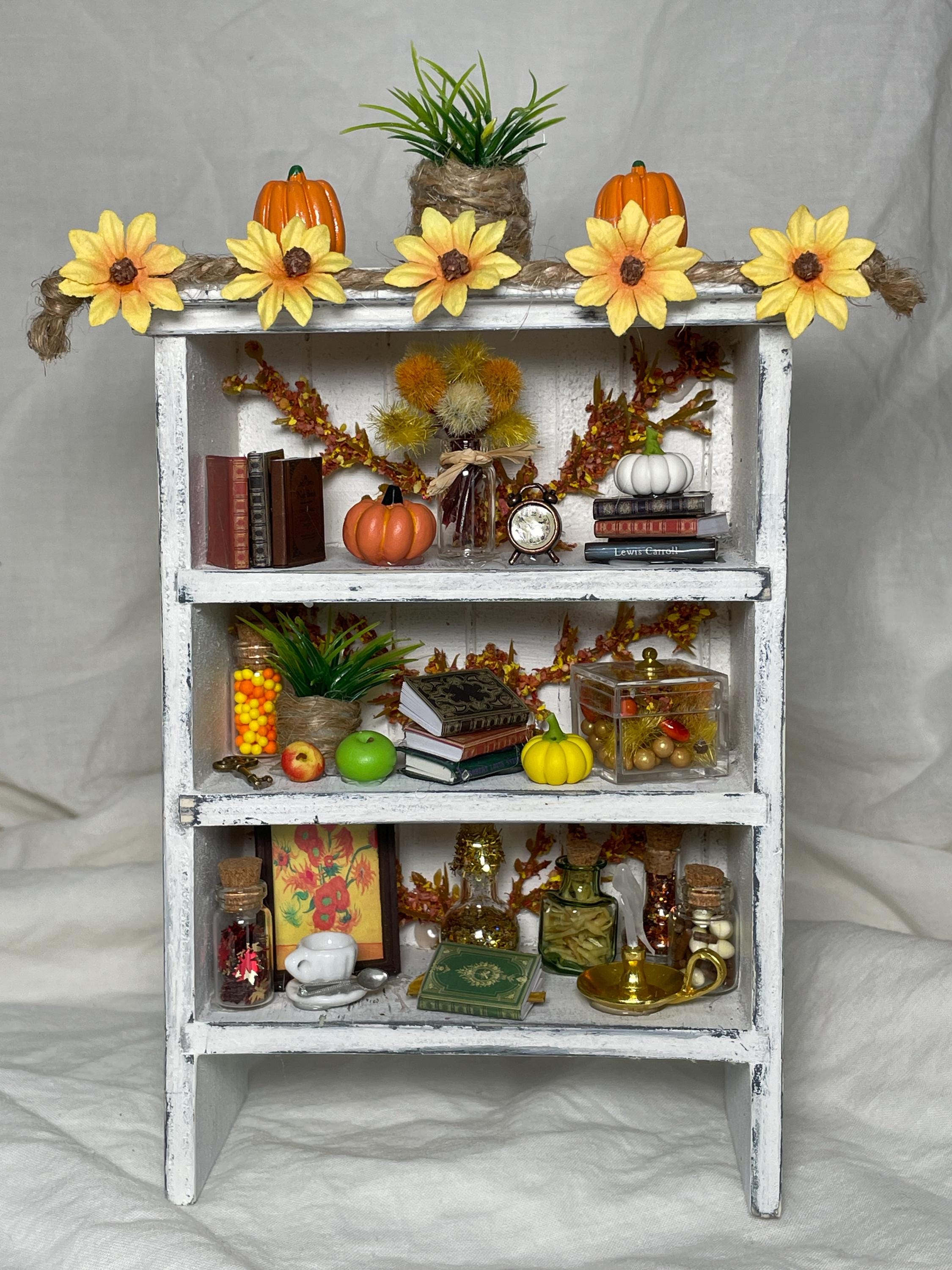 Mini Bookshelf With Fall Themed Decor Including Sunflowers, Pumpkins ...