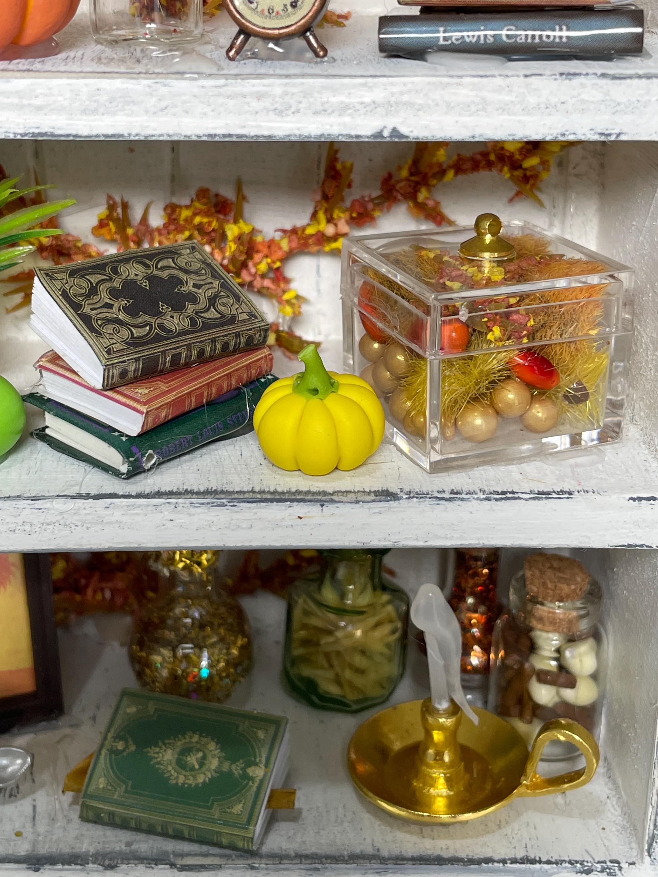 Mini Bookshelf With Fall Themed Decor Including Sunflowers, Pumpkins ...