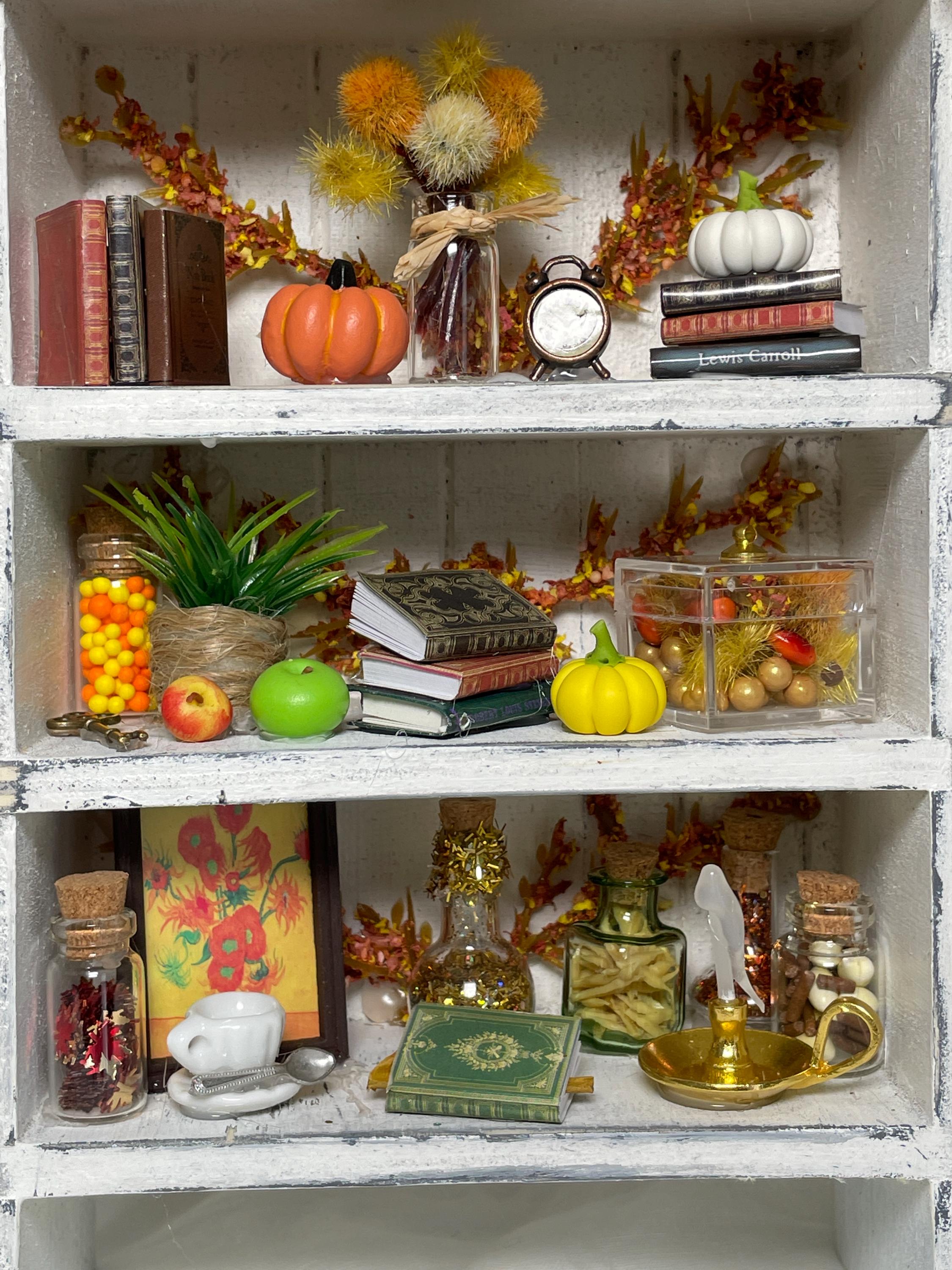 Mini Bookshelf With Fall Themed Decor Including Sunflowers, Pumpkins ...