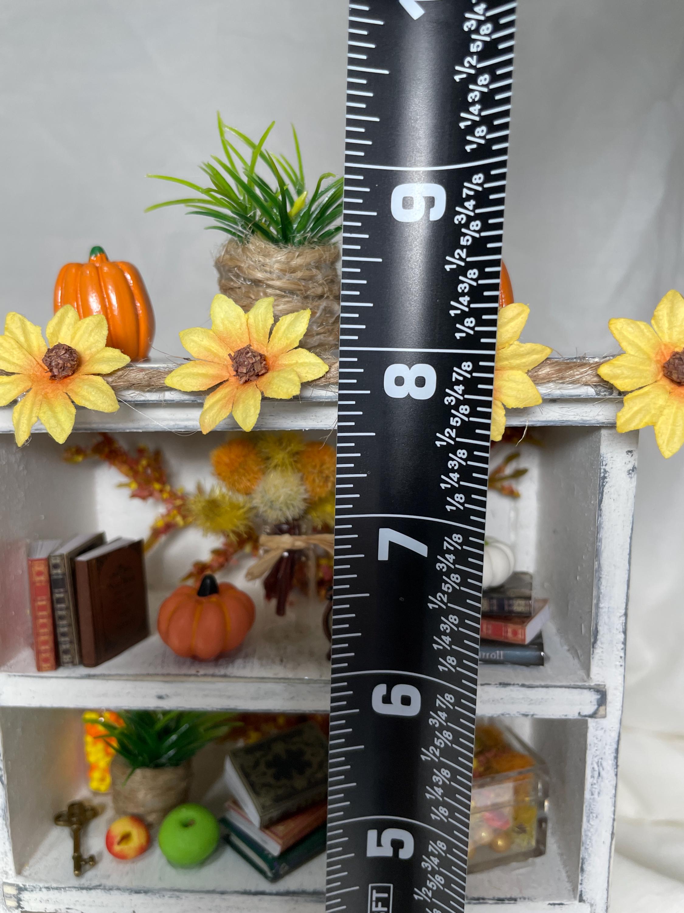 Mini Bookshelf With Fall Themed Decor Including Sunflowers, Pumpkins ...