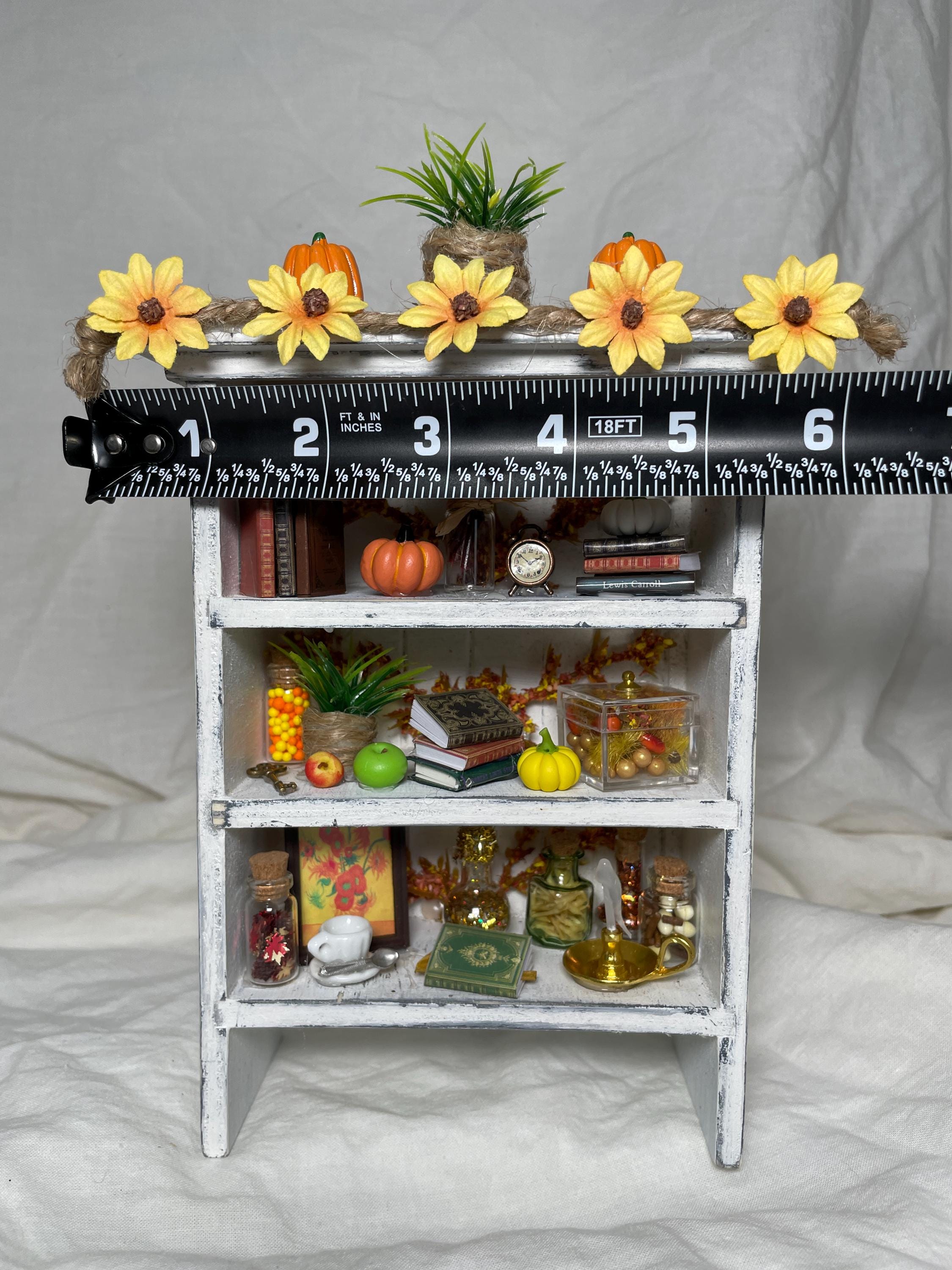 Mini Bookshelf With Fall Themed Decor Including Sunflowers, Pumpkins ...