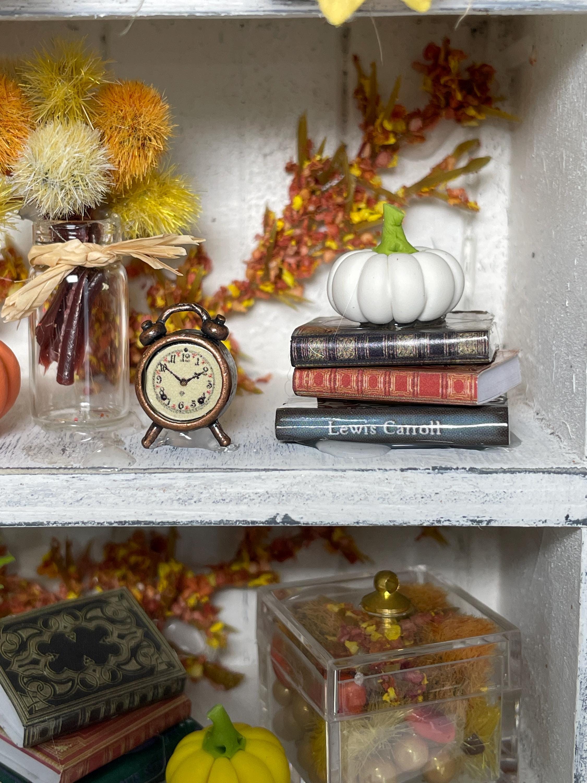 Mini Bookshelf With Fall Themed Decor Including Sunflowers, Pumpkins ...
