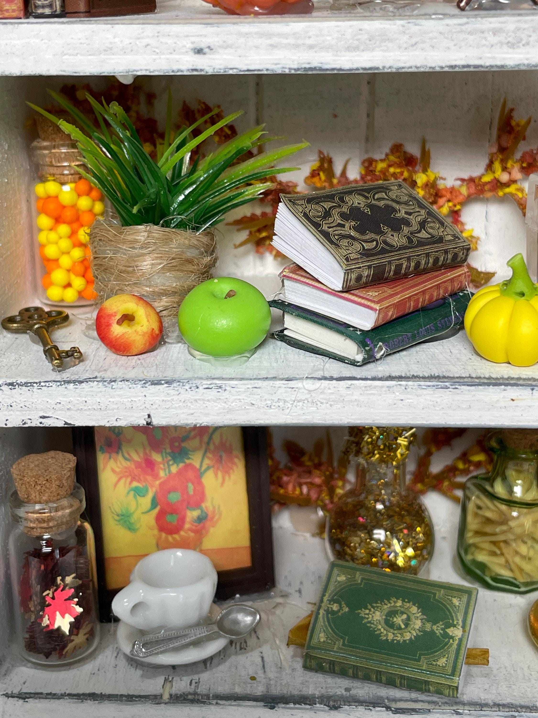 Mini Bookshelf With Fall Themed Decor Including Sunflowers, Pumpkins ...