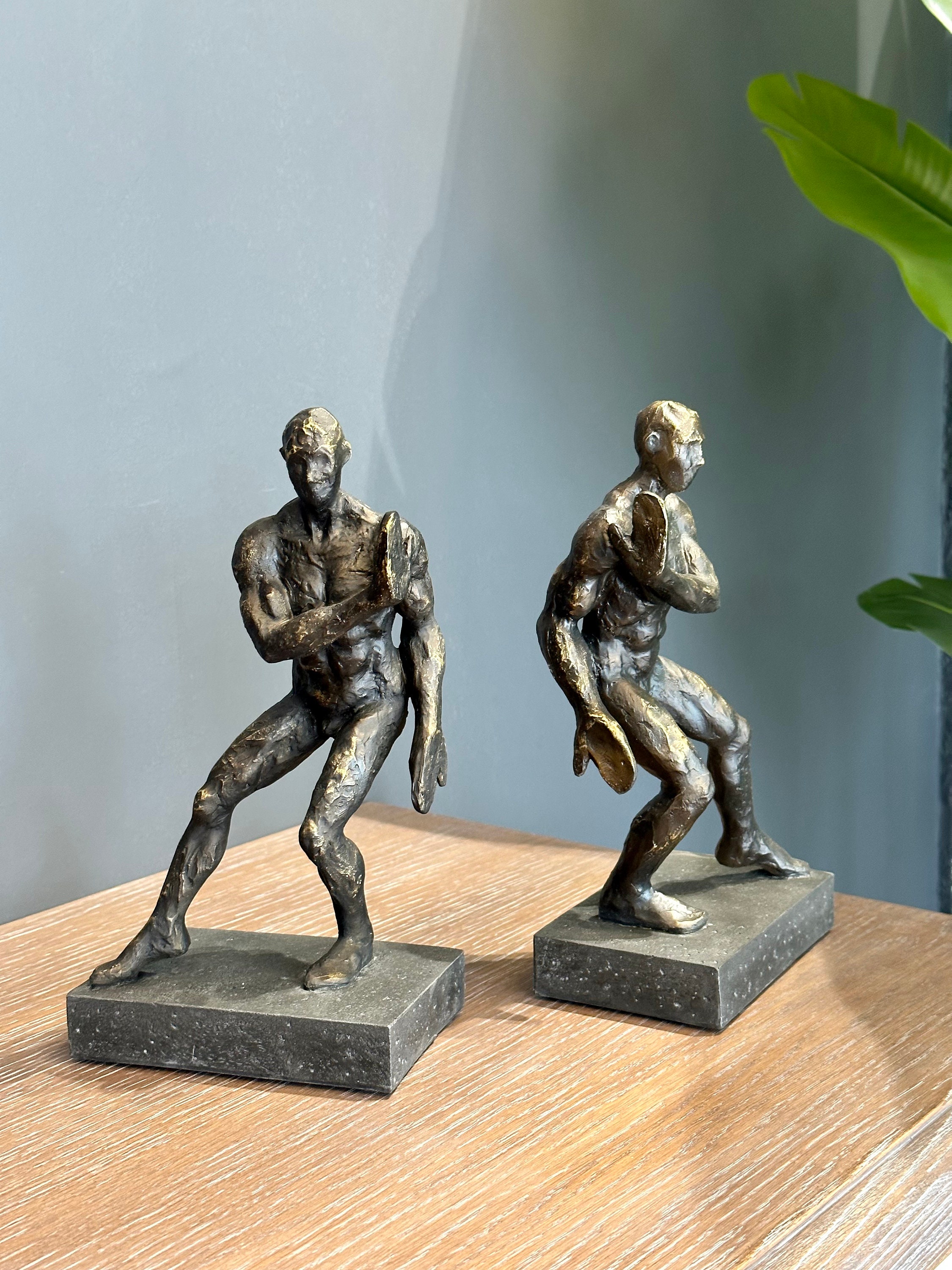 Muscular Men Bookends, Two Muscular Male Athletes Pushing Hard, Push ...
