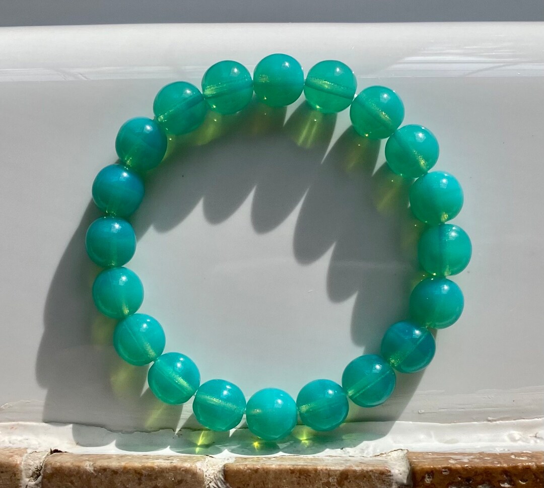 Uranium Glass Stretch Bracelet - 10mm Smooth Round Milky Blue Green ...