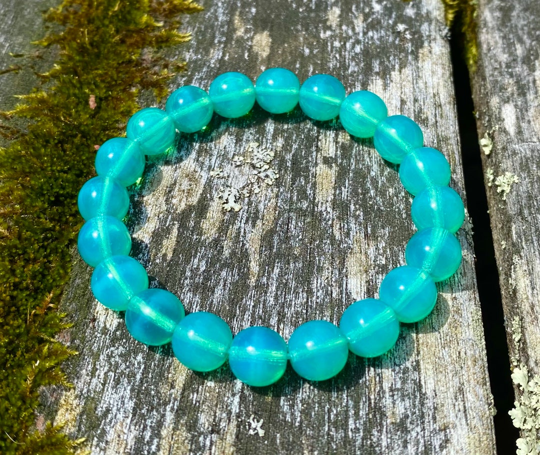 Uranium Glass Stretch Bracelet - 10mm Smooth Round Blue Green Opal UV ...