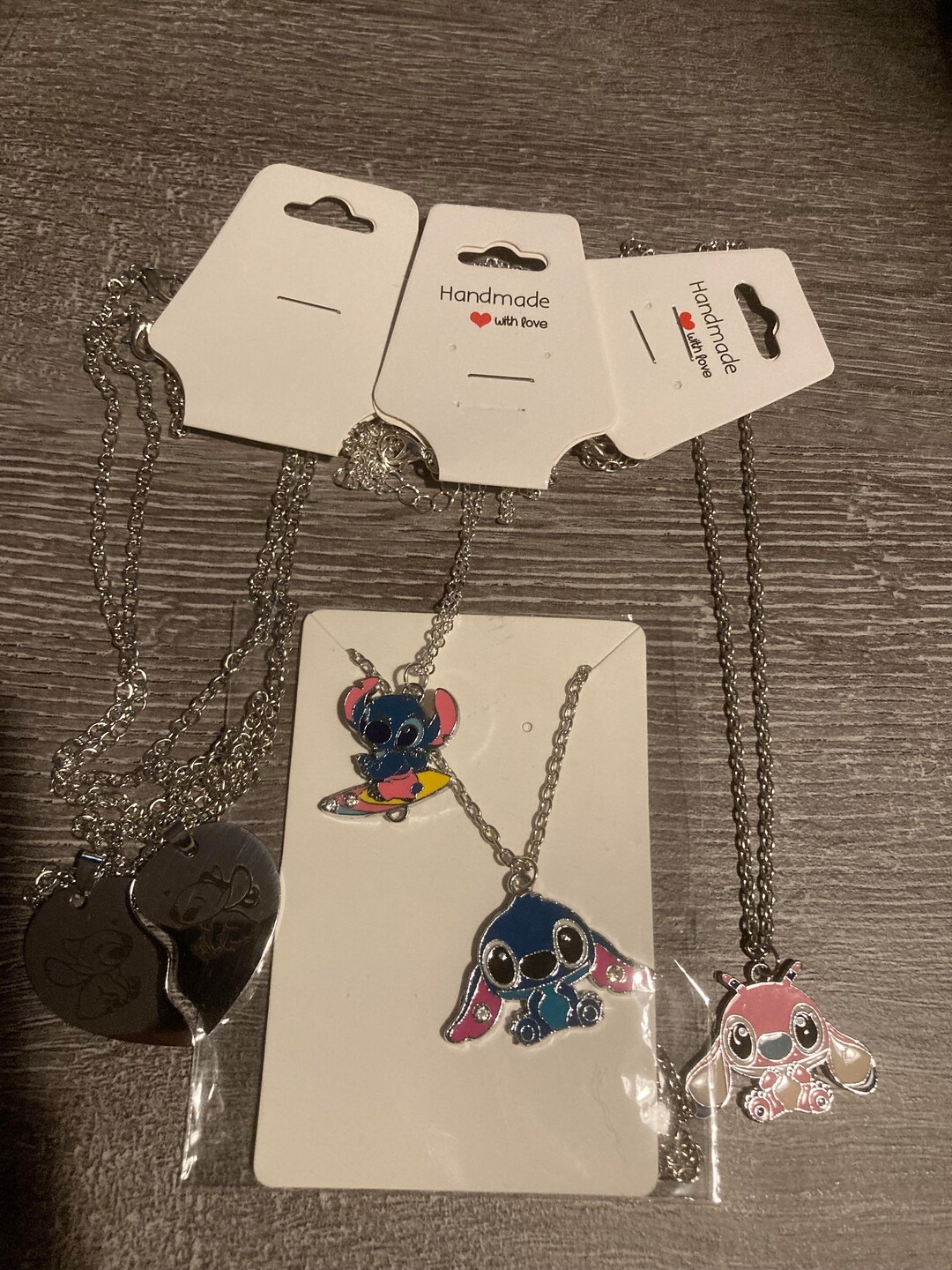 Stitch and Angel Necklaces - Etsy