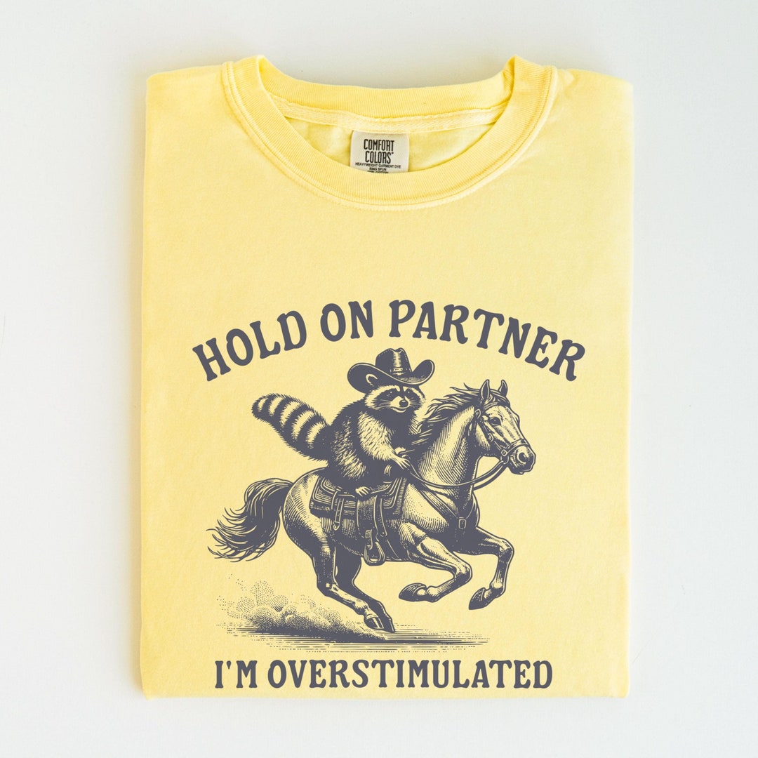 Hold on Partner I'm Overstimulated Cowboy Raccoon Graphic Tee Funny ...