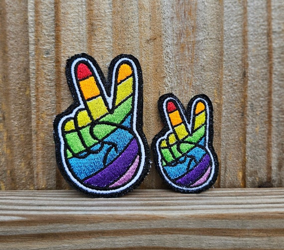 Rainbow Peace Signs Background