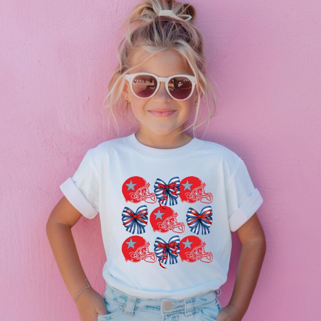 Youth Football Shirt | Comfort Colors® Red & Blue Coquette Bow Football ...