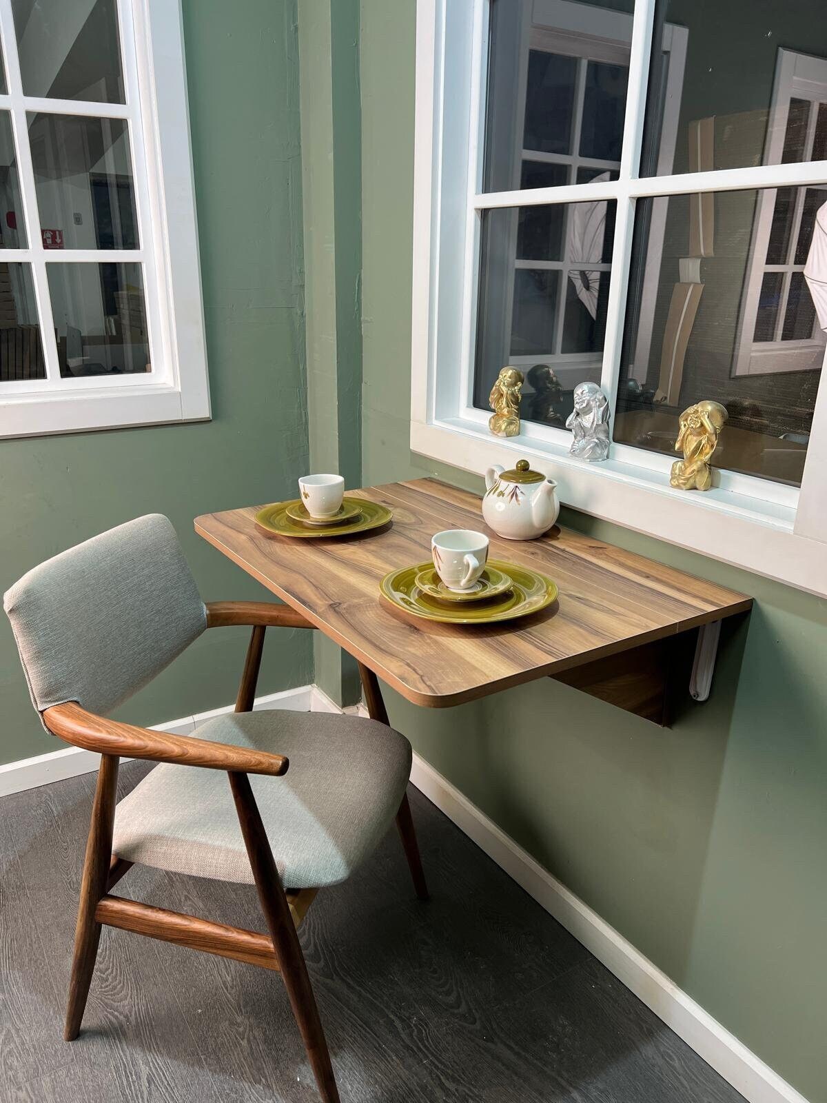 Wall mounted foldable dining table with chairs store