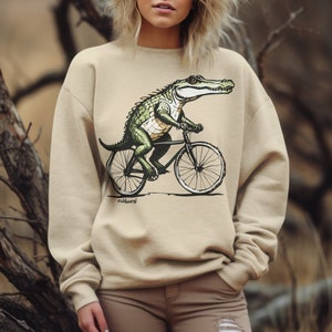 Funny Alligator Riding Bicycle Sweatshirt, Unique Animal Graphic Top ...