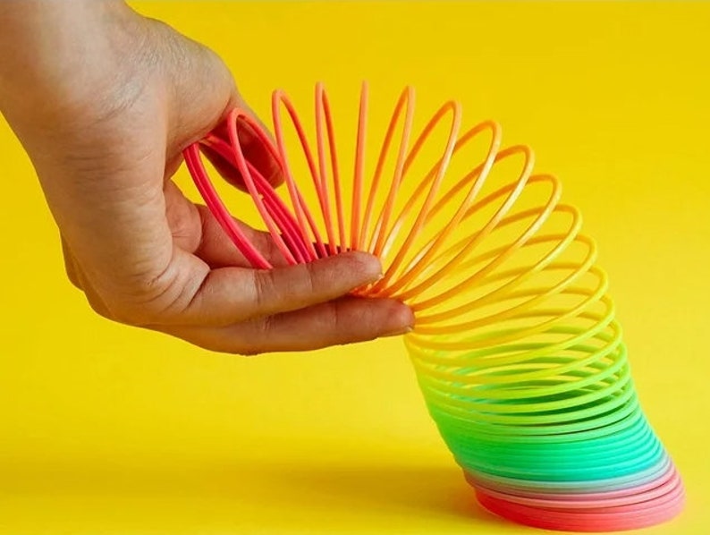 Plastic Rainbow Magic Spring Coil Toy Magic Colorful Circle Coil Kids ...