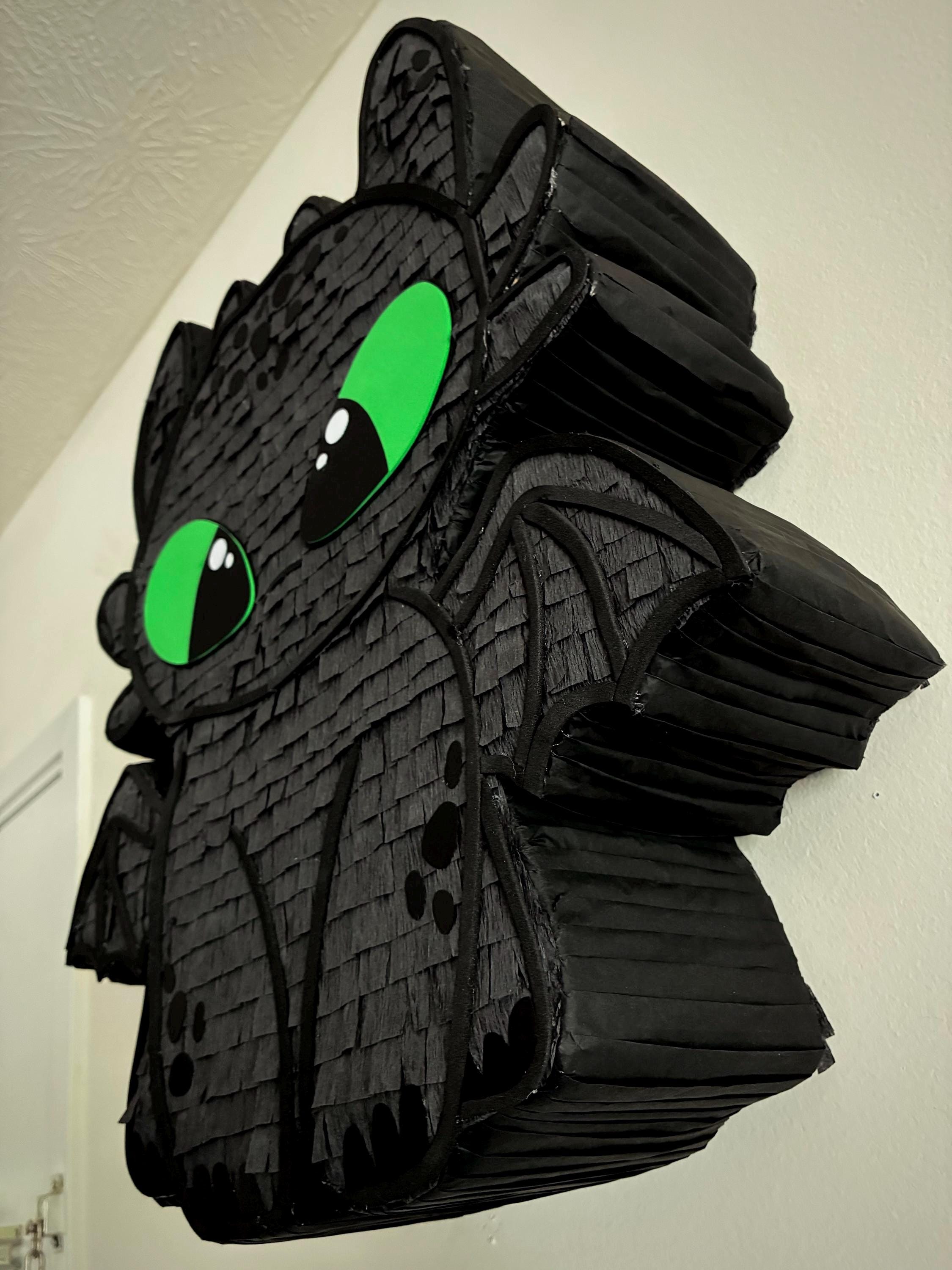 Handcrafted Black and White Dragon Piñatas | Night Fury & Light Fury ...