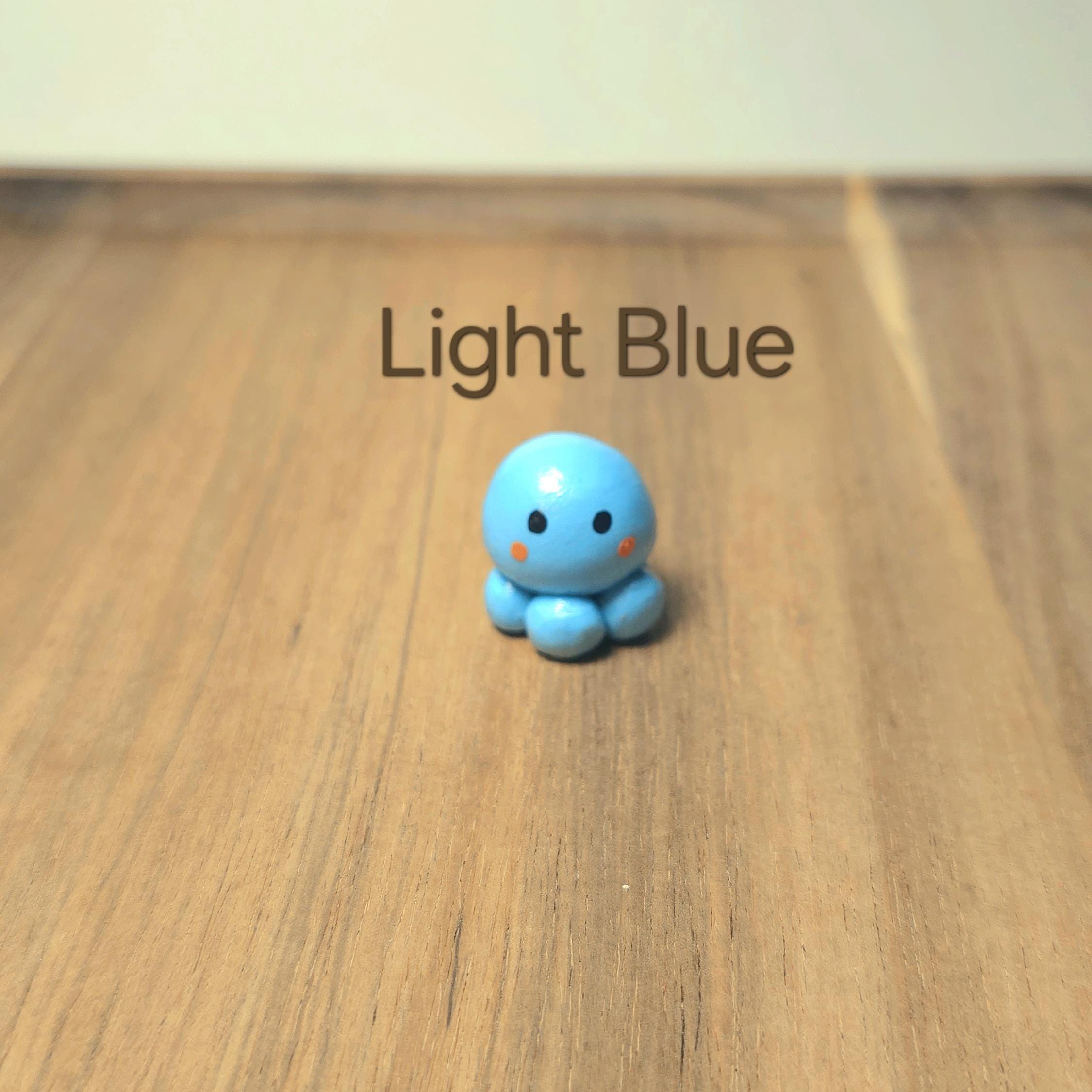 Vibrant Hand-painted Polymer Clay Octopuses Designed for Tabletop ...