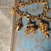Monet Signed Vintage Gold Tone Charm Bracelet With Bejeweled Charms - Etsy