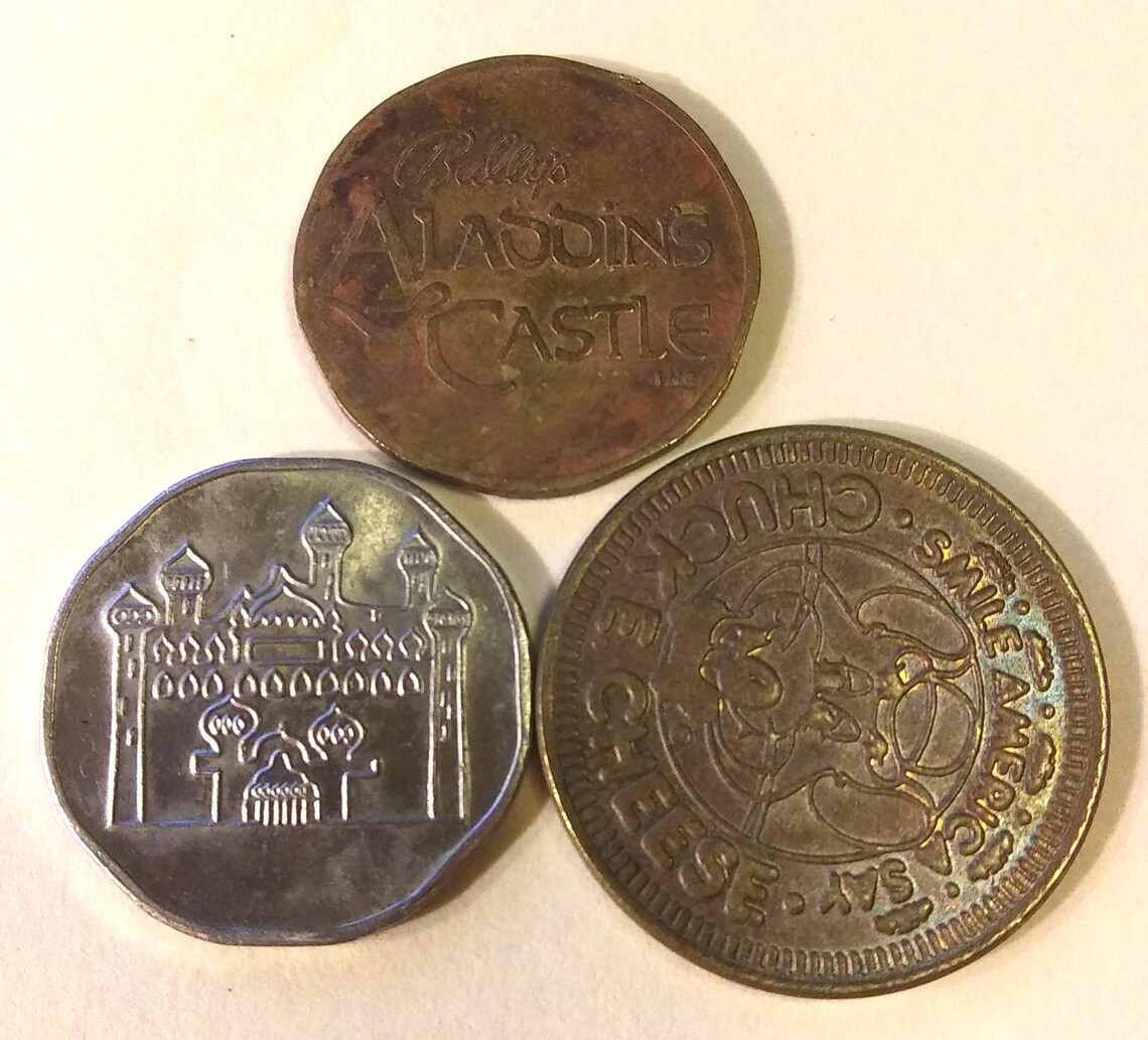 1988 Chucky Cheese and Two Aladdin Arcade Tokens 3 Coin Set in Hard ...