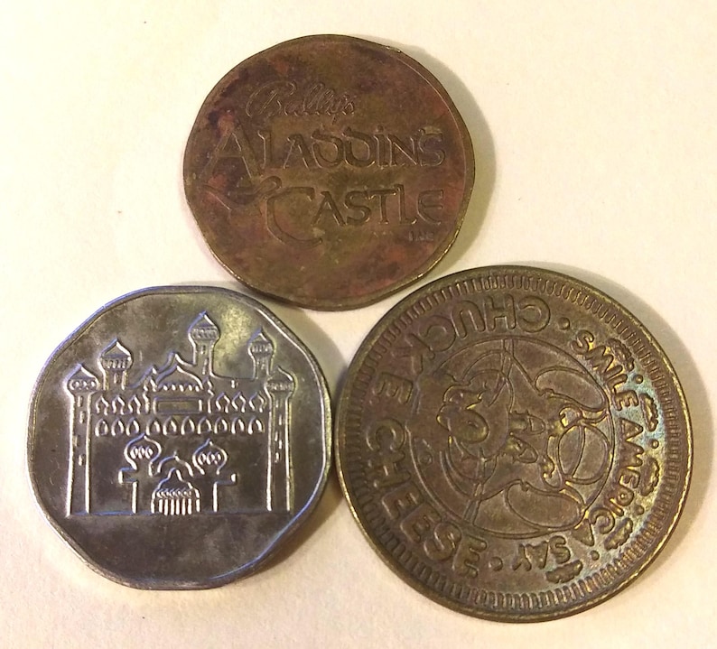 1988 Chucky Cheese and Two Aladdin Arcade Tokens 3 Coin Set in Hard ...