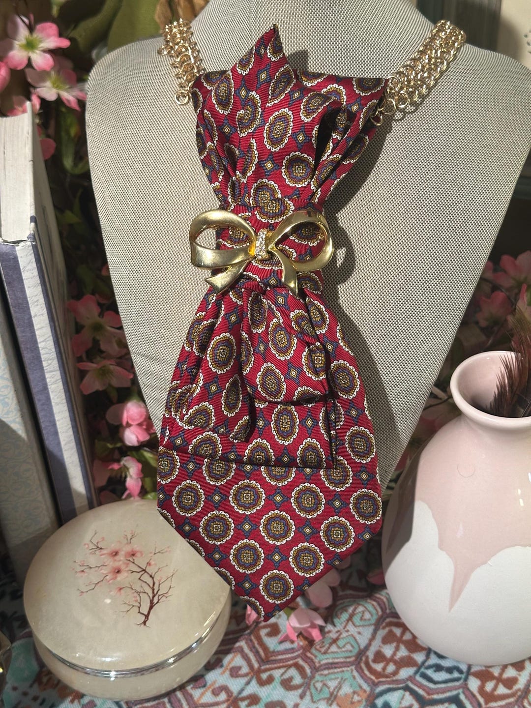 Elegantly Repurposed Classic Led Patterned Necktie With Gold Bow Brooch ...