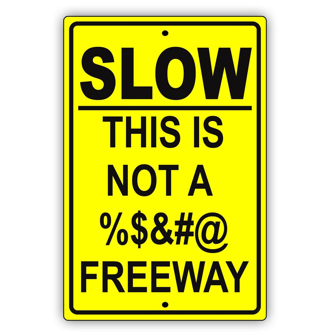 Slow This is Not A %& Freeway Yellow Metal Sign Driveway Road Street ...