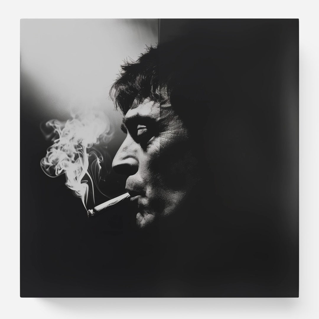 Tony Montana's Iconic Mafia Figure Smoking in Classic Black and White ...