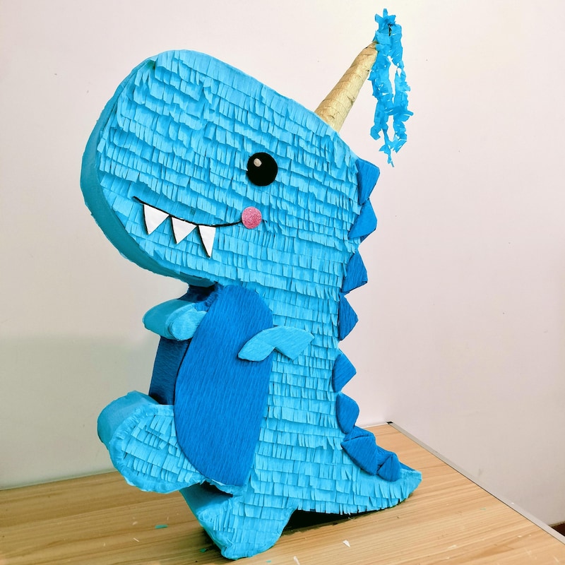 Piñata de dinosaurio - Etsy España