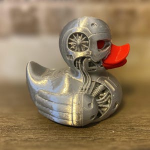 The Duckinator - 3D Printed Figurine - Car Dashboard Decor - Ducking ...