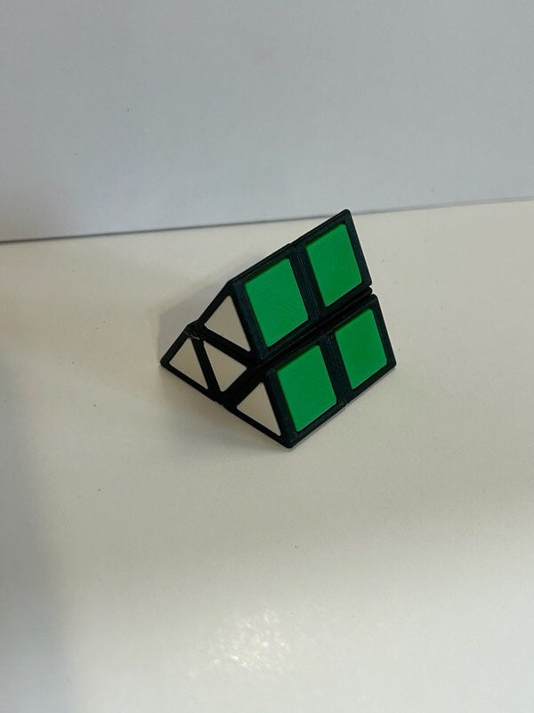 The Grimace - Triangular Prism Twisty Puzzle - Etsy