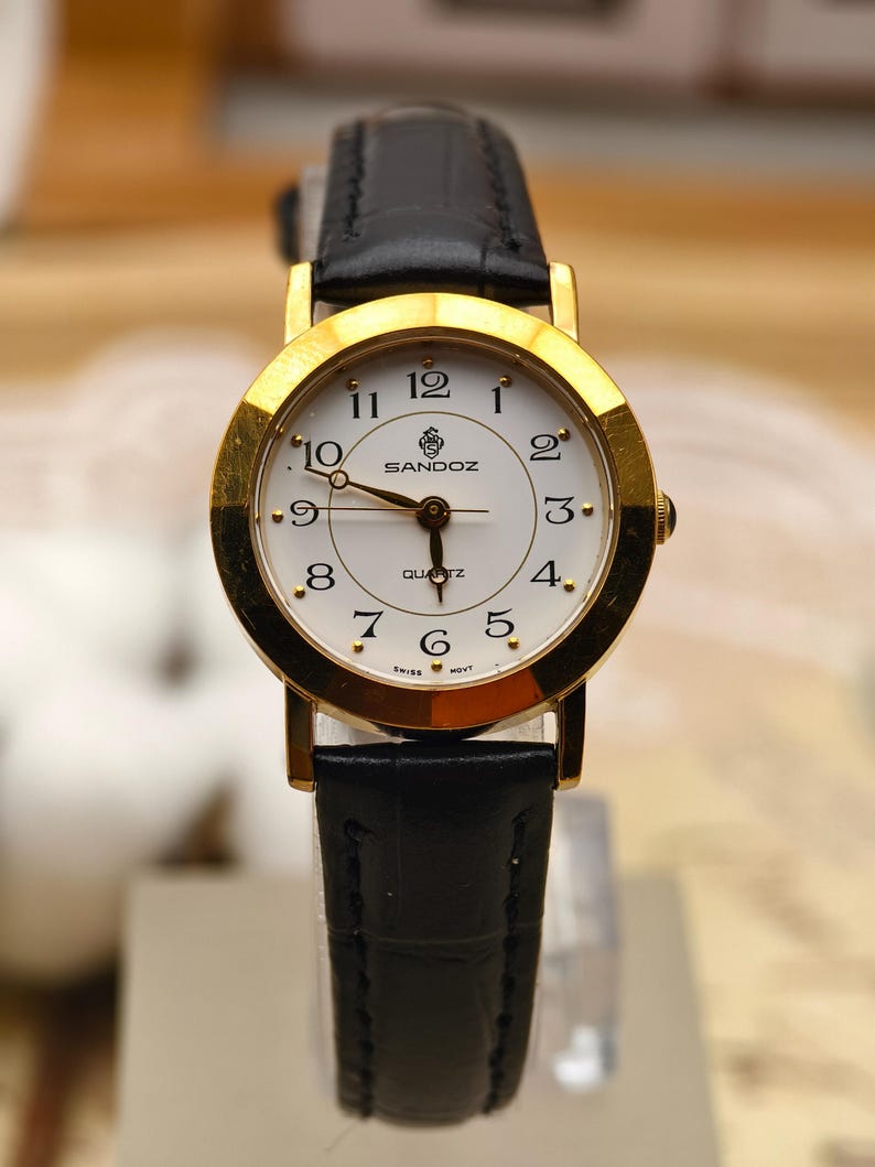 Sandoz Ladies Quartz Gold Tone Watch White Dial Black Leather Strap 24 ...