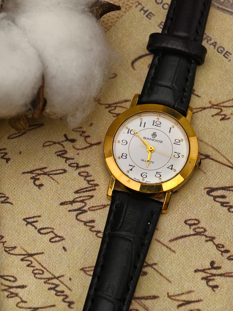 Sandoz Ladies Quartz Gold Tone Watch White Dial Black Leather Strap 24 ...