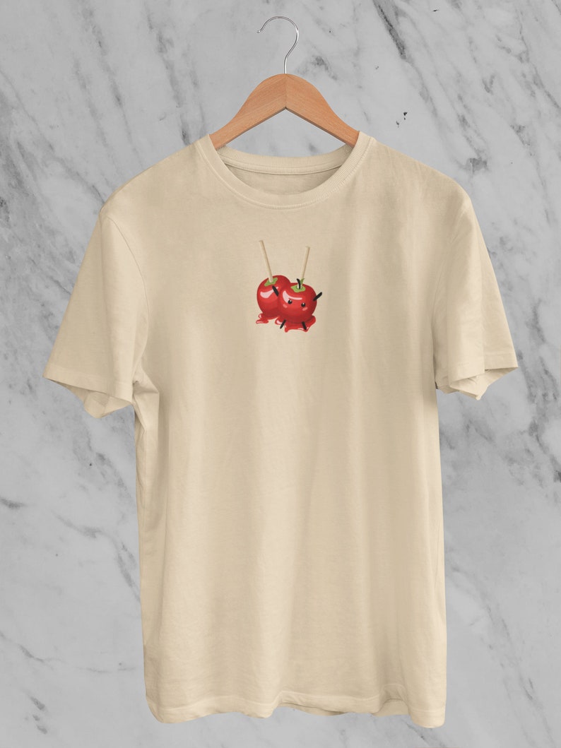 Stardew Valley Fair Tee: Candy Apple Junimo Graphic Tee - Etsy