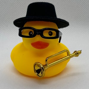 A Rubber Duck Playing a Musical Instrument of Your Choice, Adorned With ...