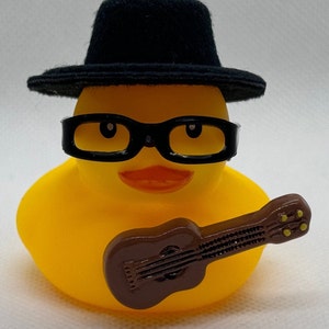 A Rubber Duck Playing a Musical Instrument of Your Choice, Adorned With ...