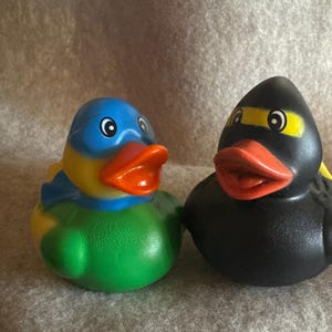 Superhero and Robber Duck - Etsy