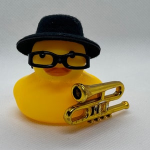 A Rubber Duck Playing a Musical Instrument of Your Choice, Adorned With ...