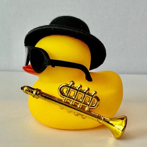 A Rubber Duck Playing a Musical Instrument of Your Choice, Adorned With ...