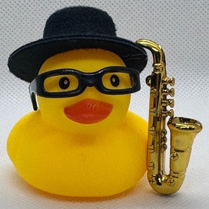 A Rubber Duck Playing a Musical Instrument of Your Choice, Adorned With ...