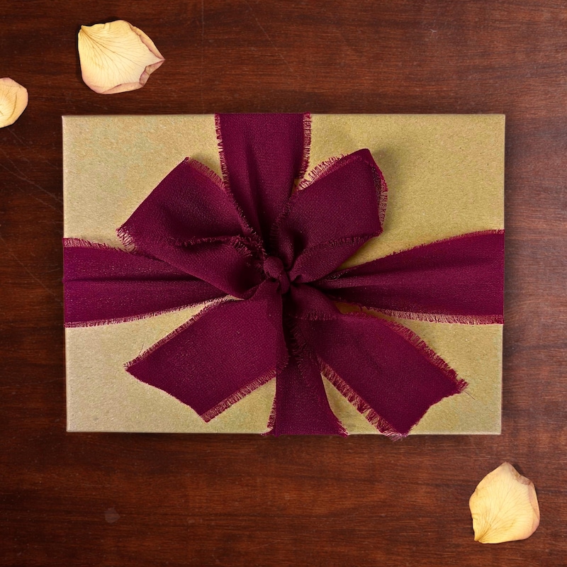 Gift Box With Red Ribbon - 60+ Gift Ideas for 2026